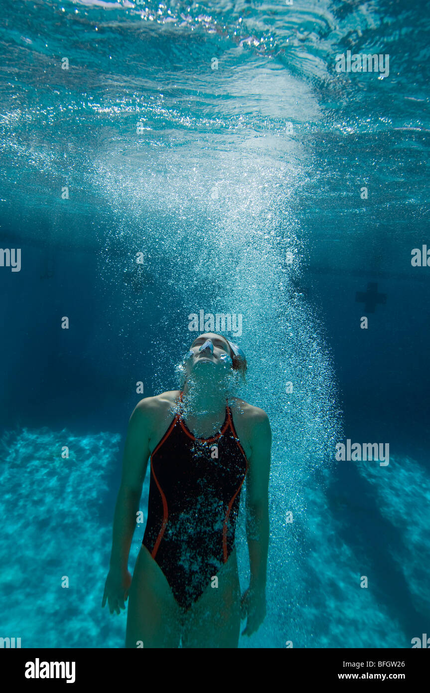 Young female swimmer in swimming pool Stock Photo - Alamy