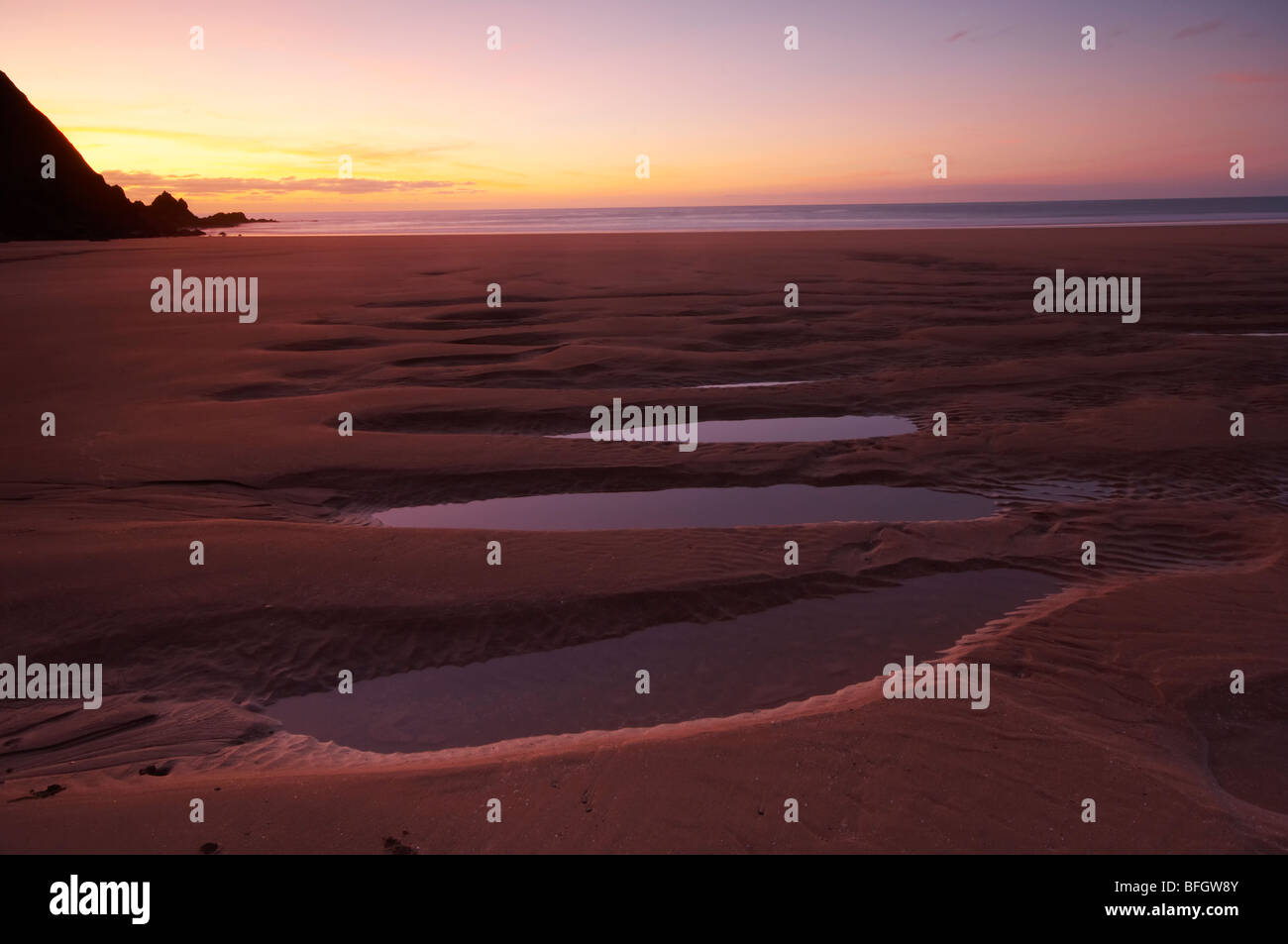 Putsborough beach at dusk on the North Devon coast UK Stock Photo - Alamy
