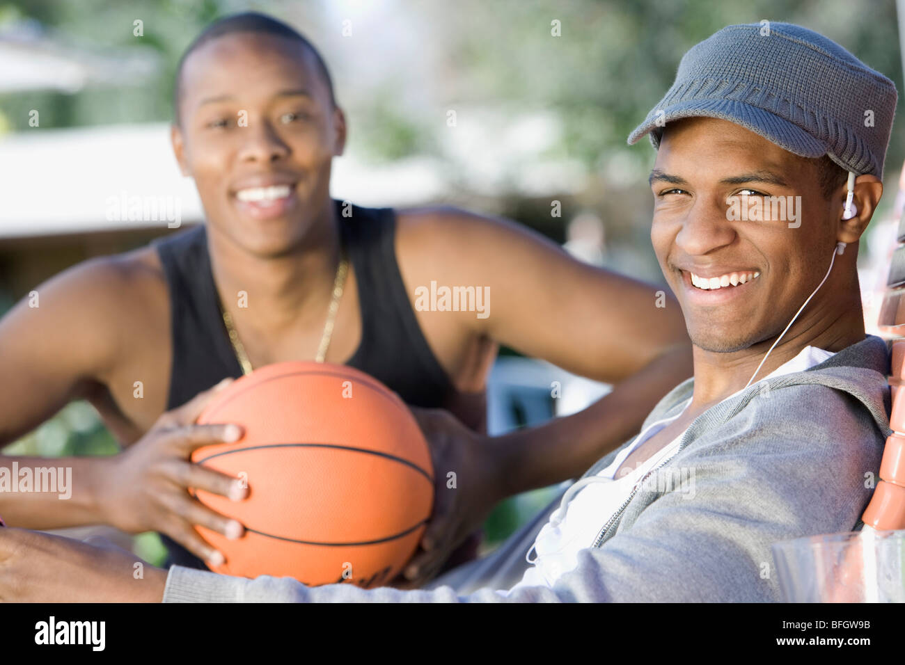 Two Young Men with Basketball, Portrait Stock Photo - Alamy