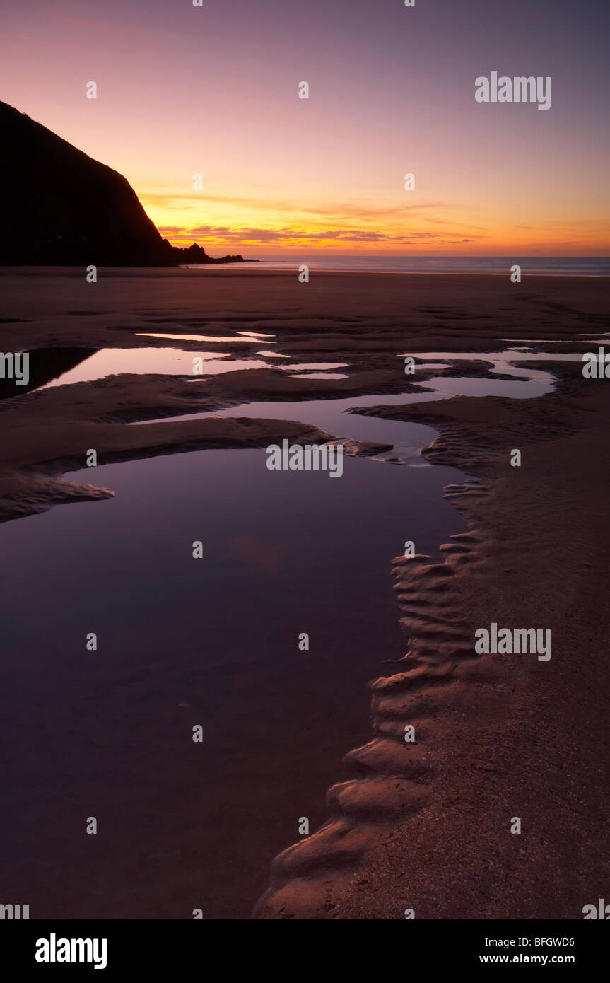 Putsborough beach at dusk on the North Devon coast UK Stock Photo - Alamy