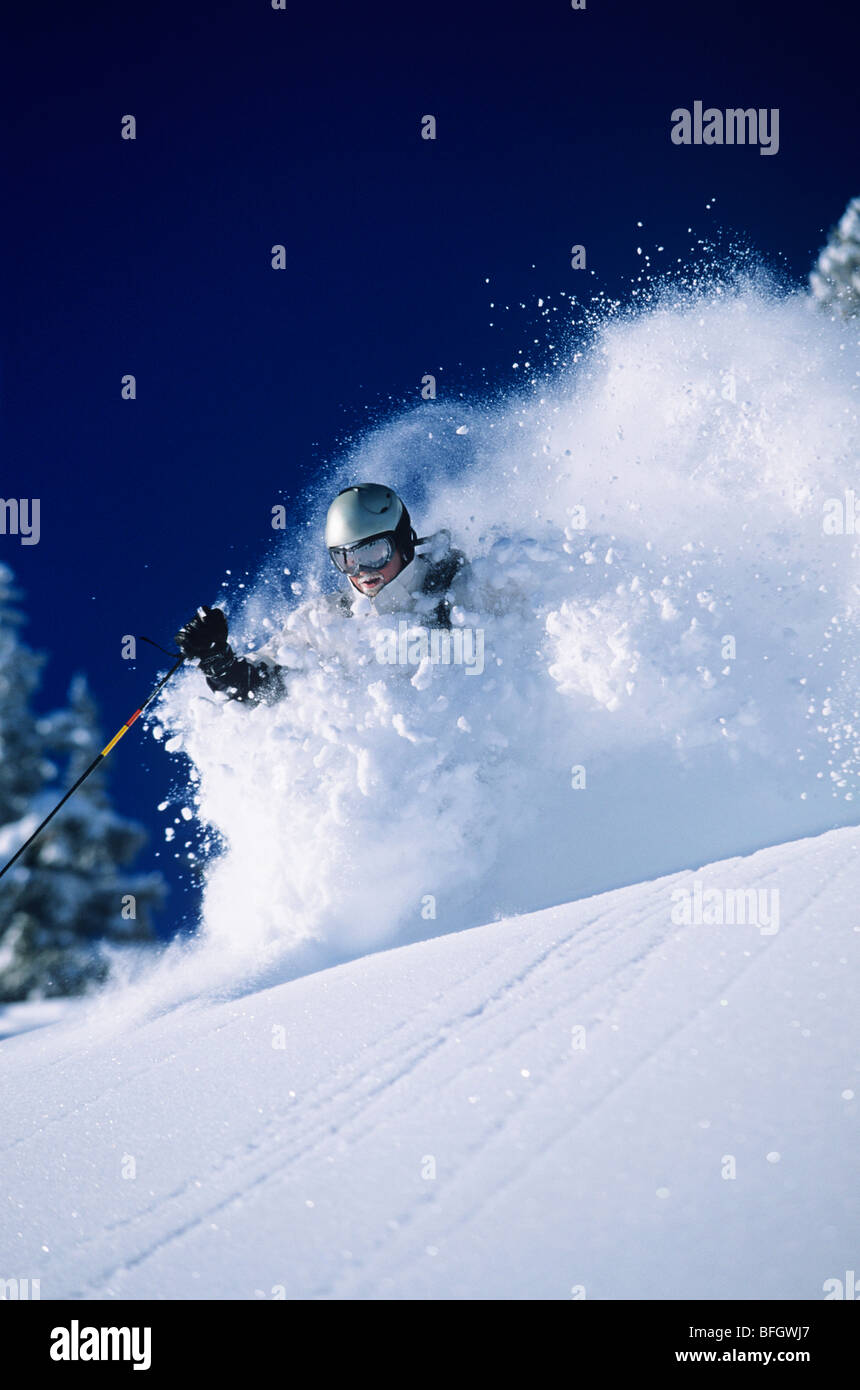 Powder winter activities young men hi-res stock photography and images ...