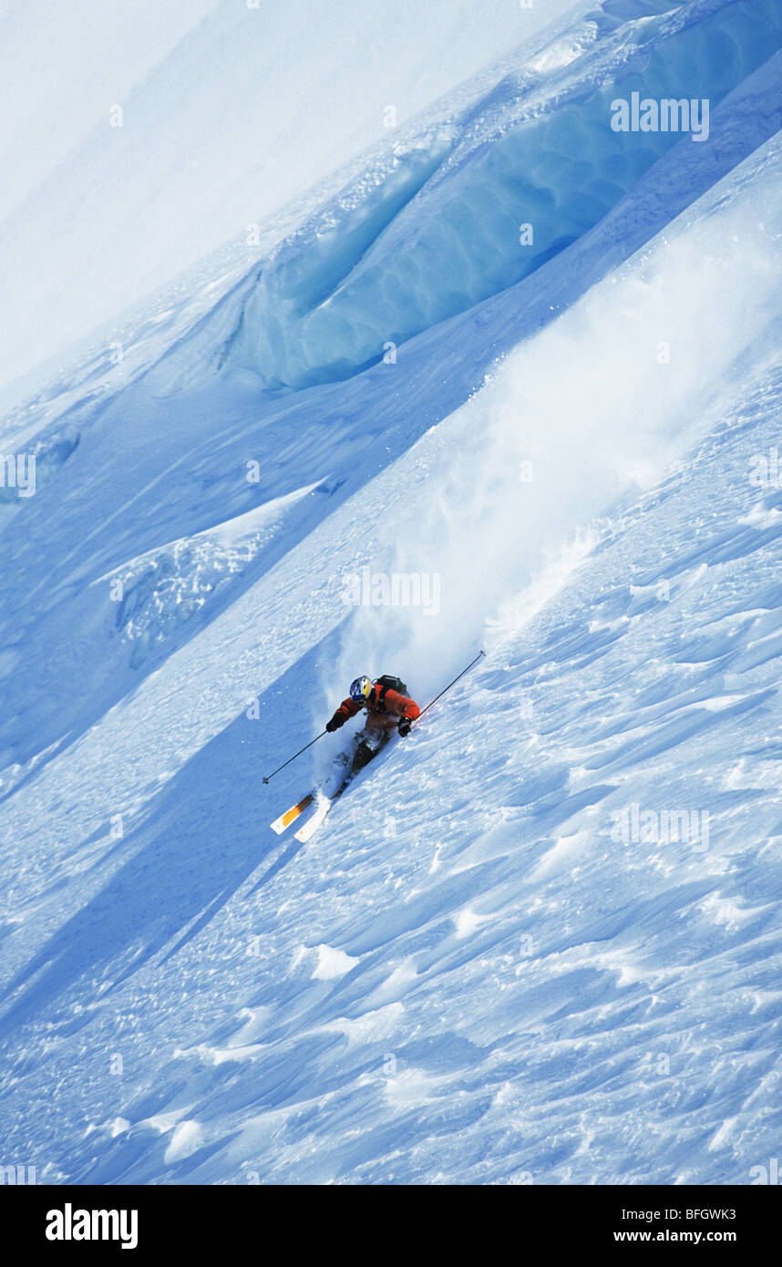 Skier on steep slope, elevated view Stock Photo - Alamy