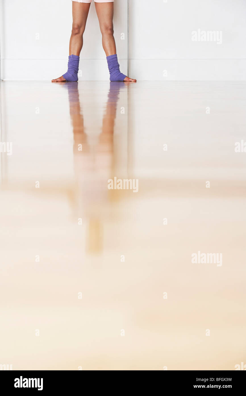 Ballet dancer and reflection, lower section Stock Photo - Alamy