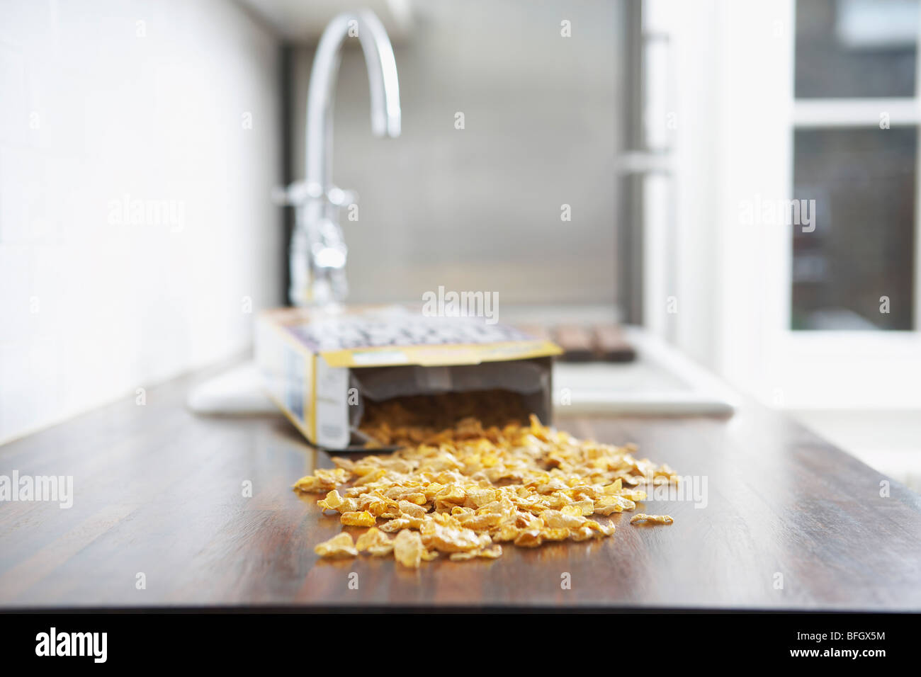 Spilled cereal on kitchen counter Stock Photo - Alamy