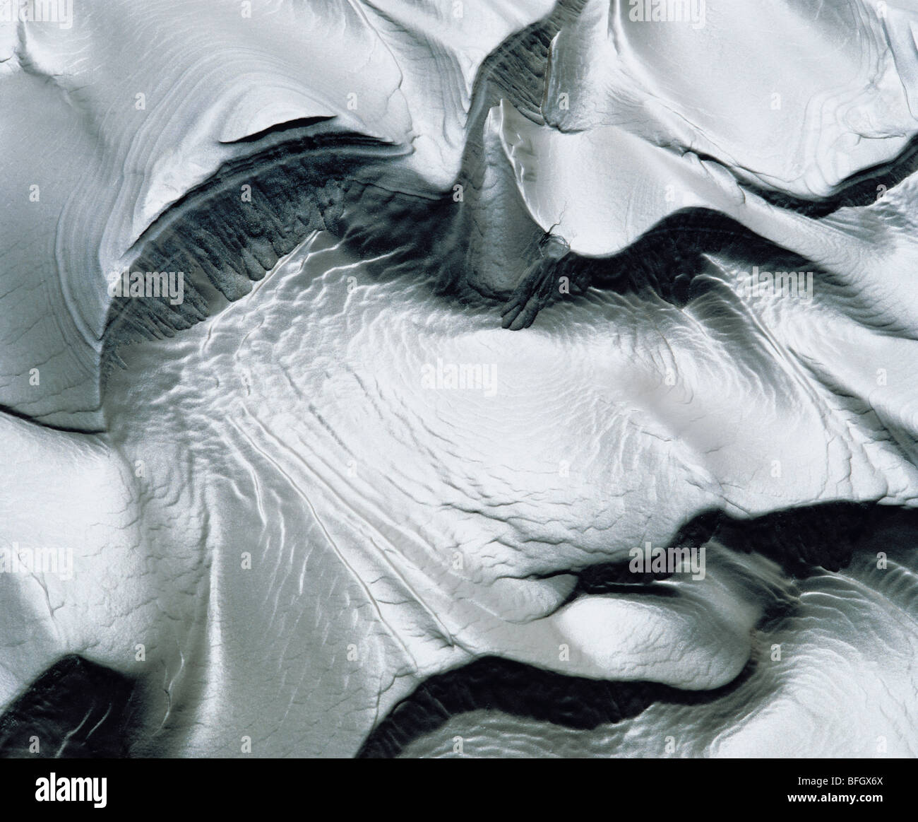 Patterns in wet sand Stock Photo - Alamy