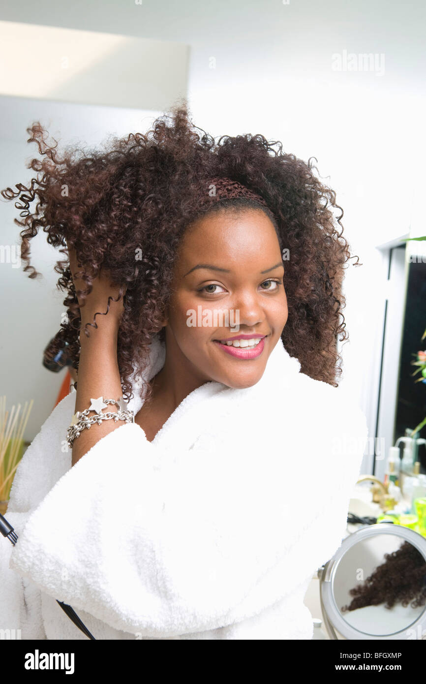 Woman wearing bathroom robe hi-res stock photography and images - Alamy