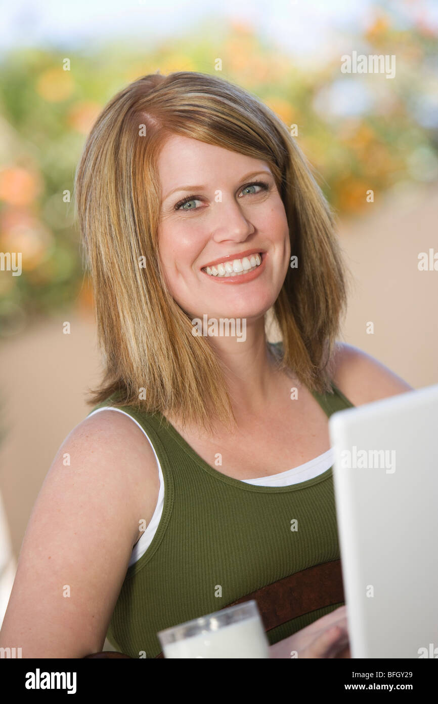 Young Woman Smiling Stock Photo - Alamy