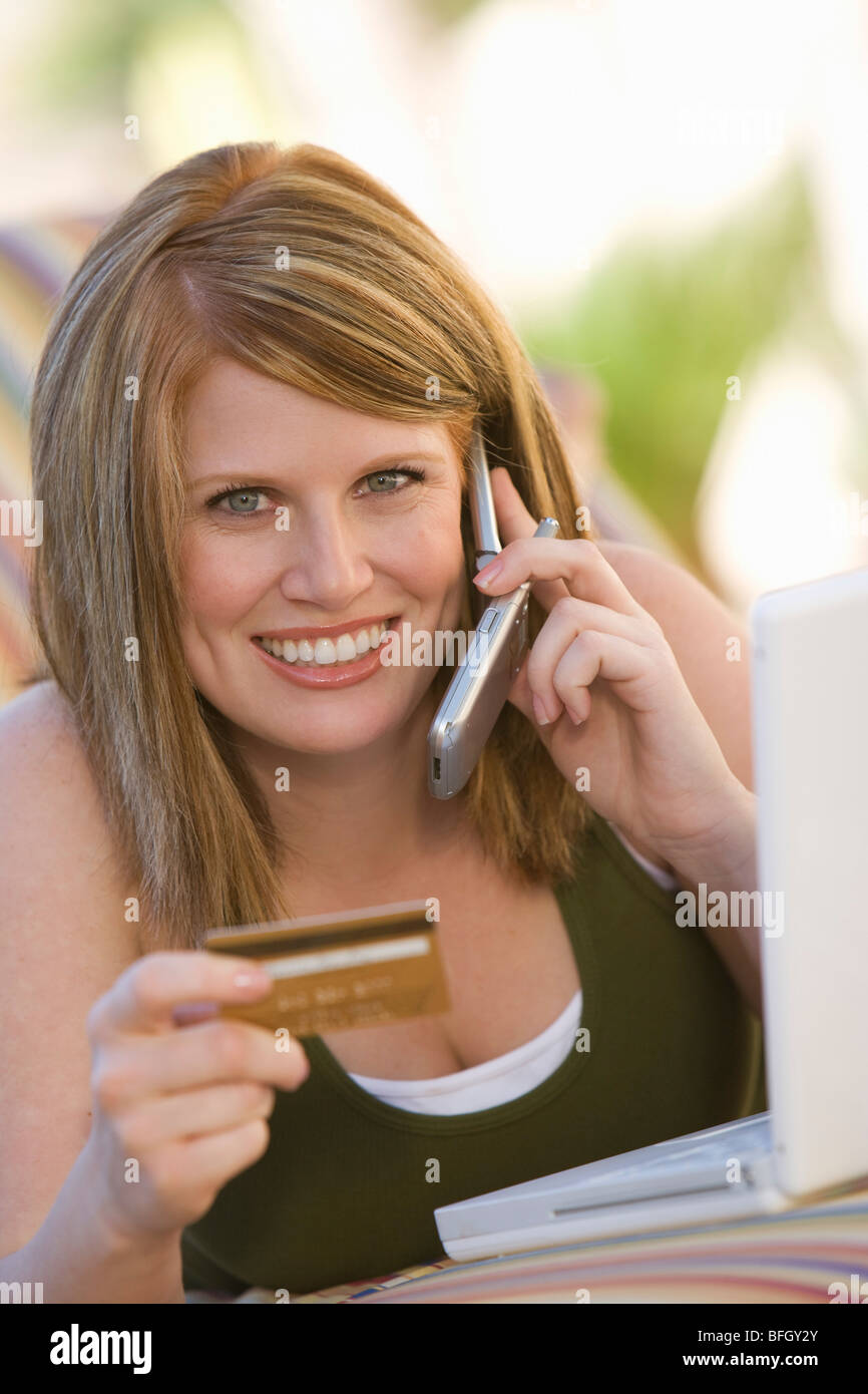 Woman Making Credit Card Purchase Stock Photo - Alamy