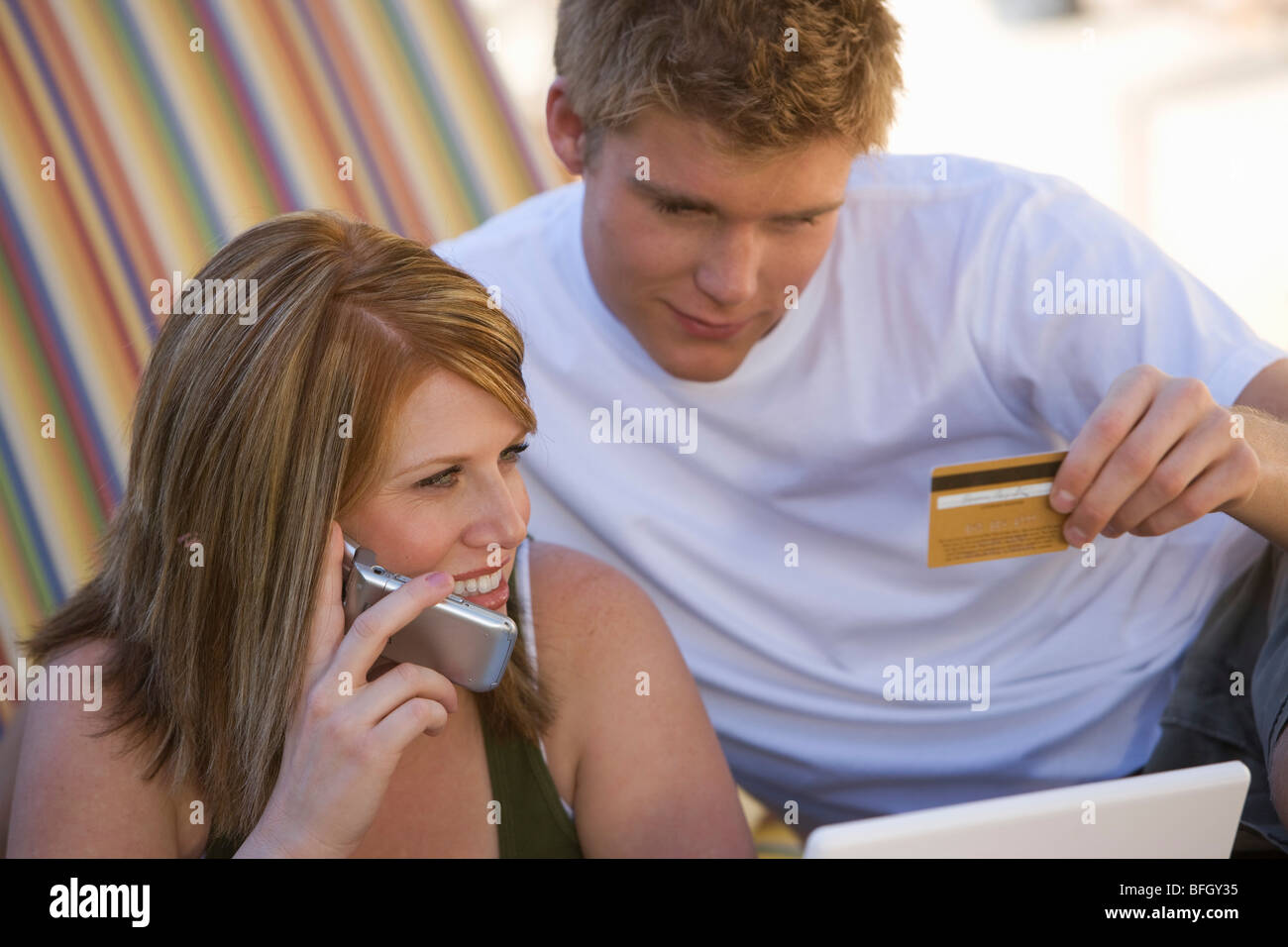 Couple Making Credit Card Purchase Stock Photo - Alamy