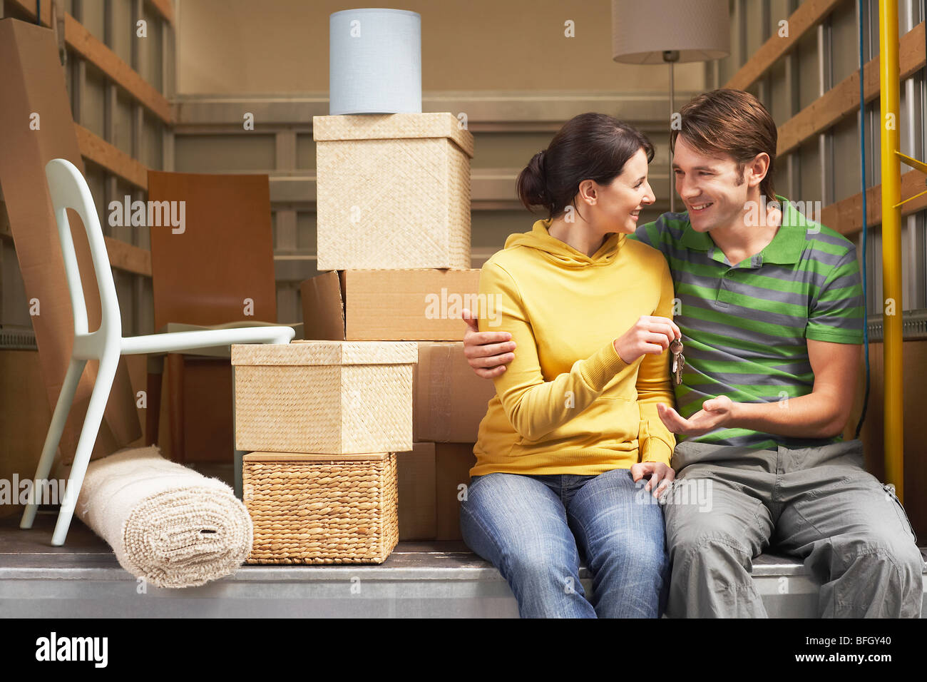 Couple handing back keys hi-res stock photography and images - Alamy