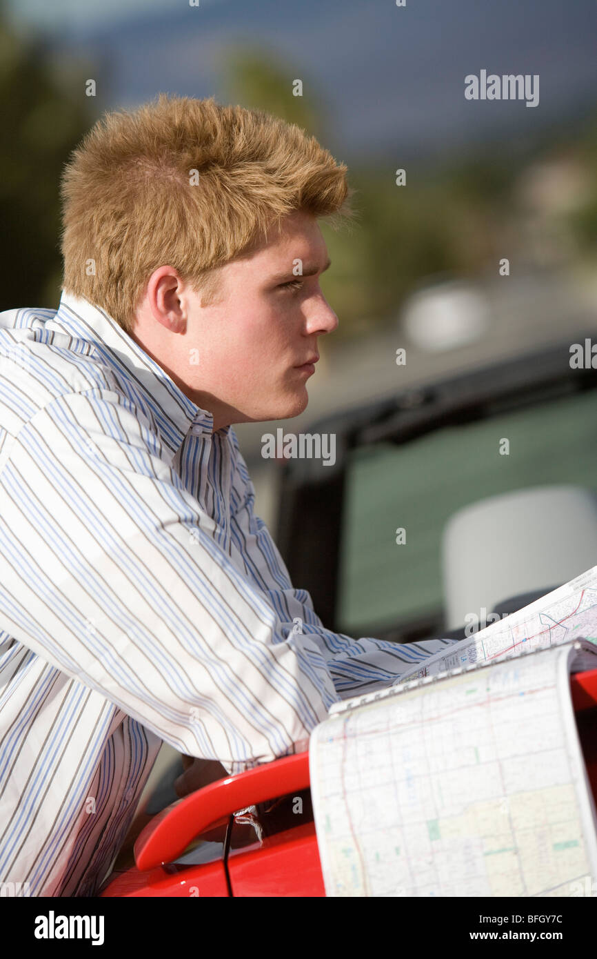 Man Looking at Road Map Stock Photo - Alamy