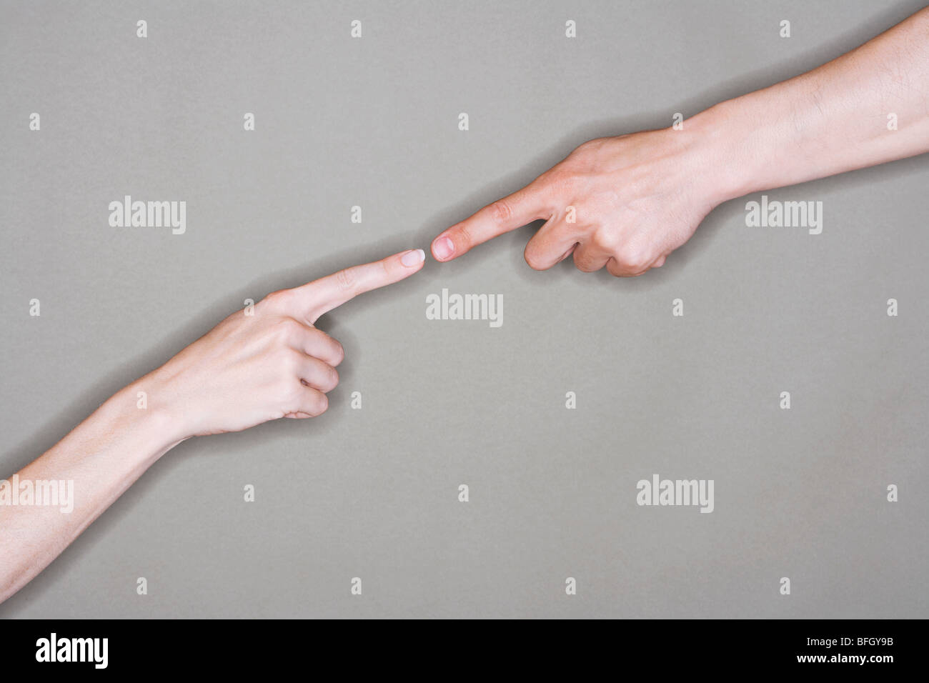 Two index fingers touching hi-res stock photography and images - Alamy