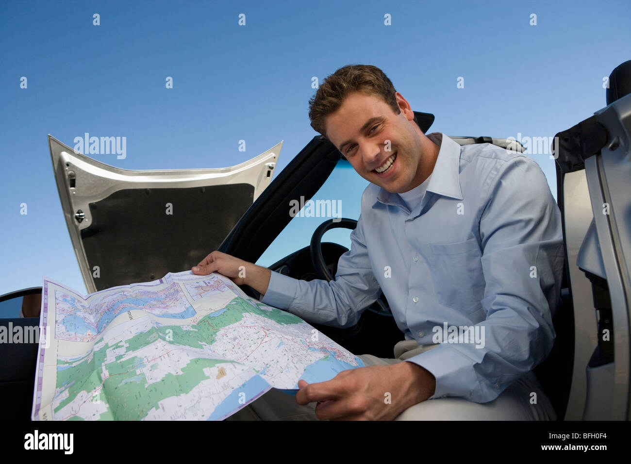 Man Looking at Map Stock Photo - Alamy