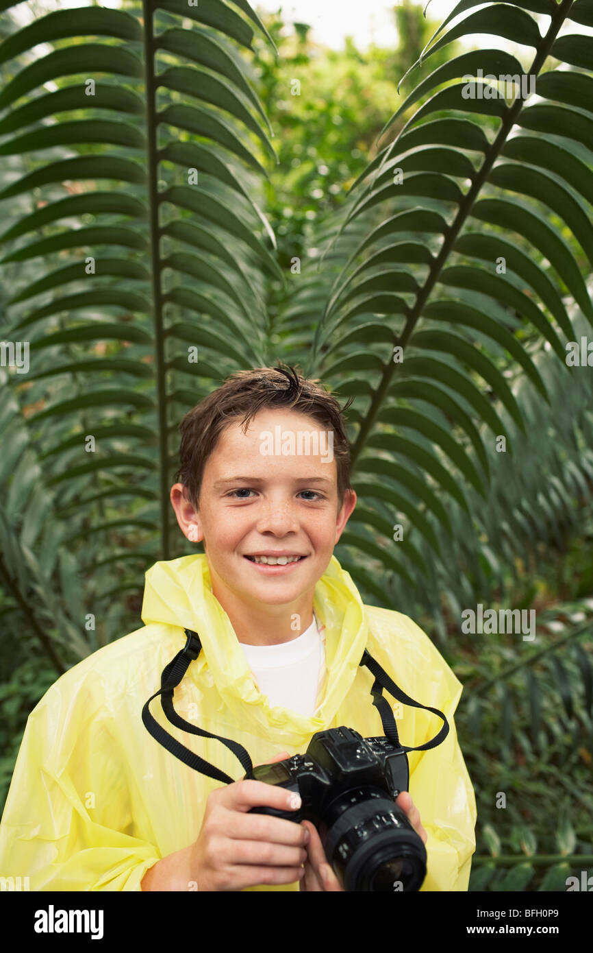 Boy with Camera Stock Photo - Alamy