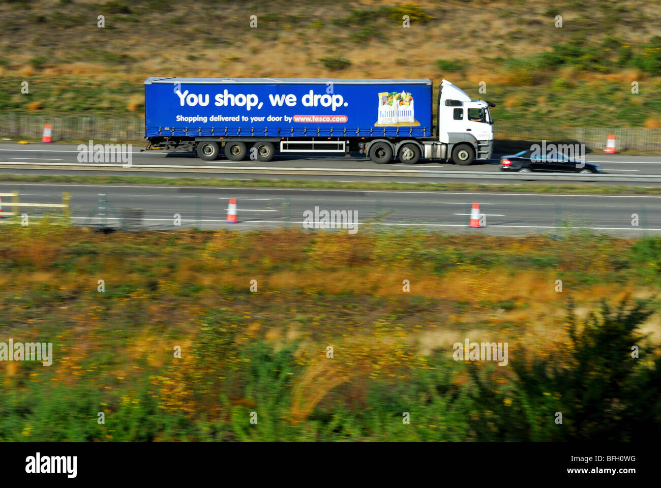 Tesco lorry on motorway Stock Photo - Alamy