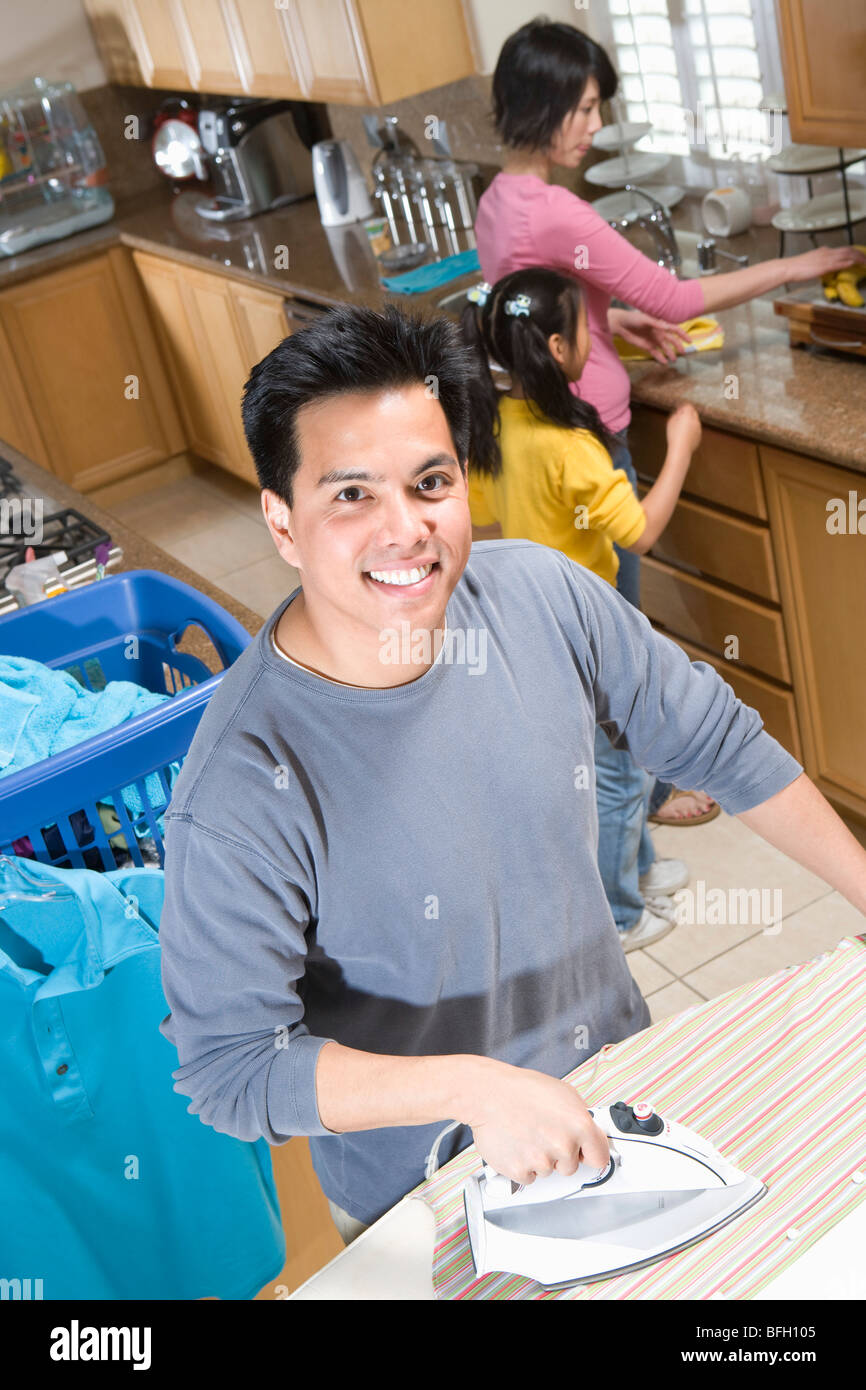 Family doing housework Stock Photo - Alamy