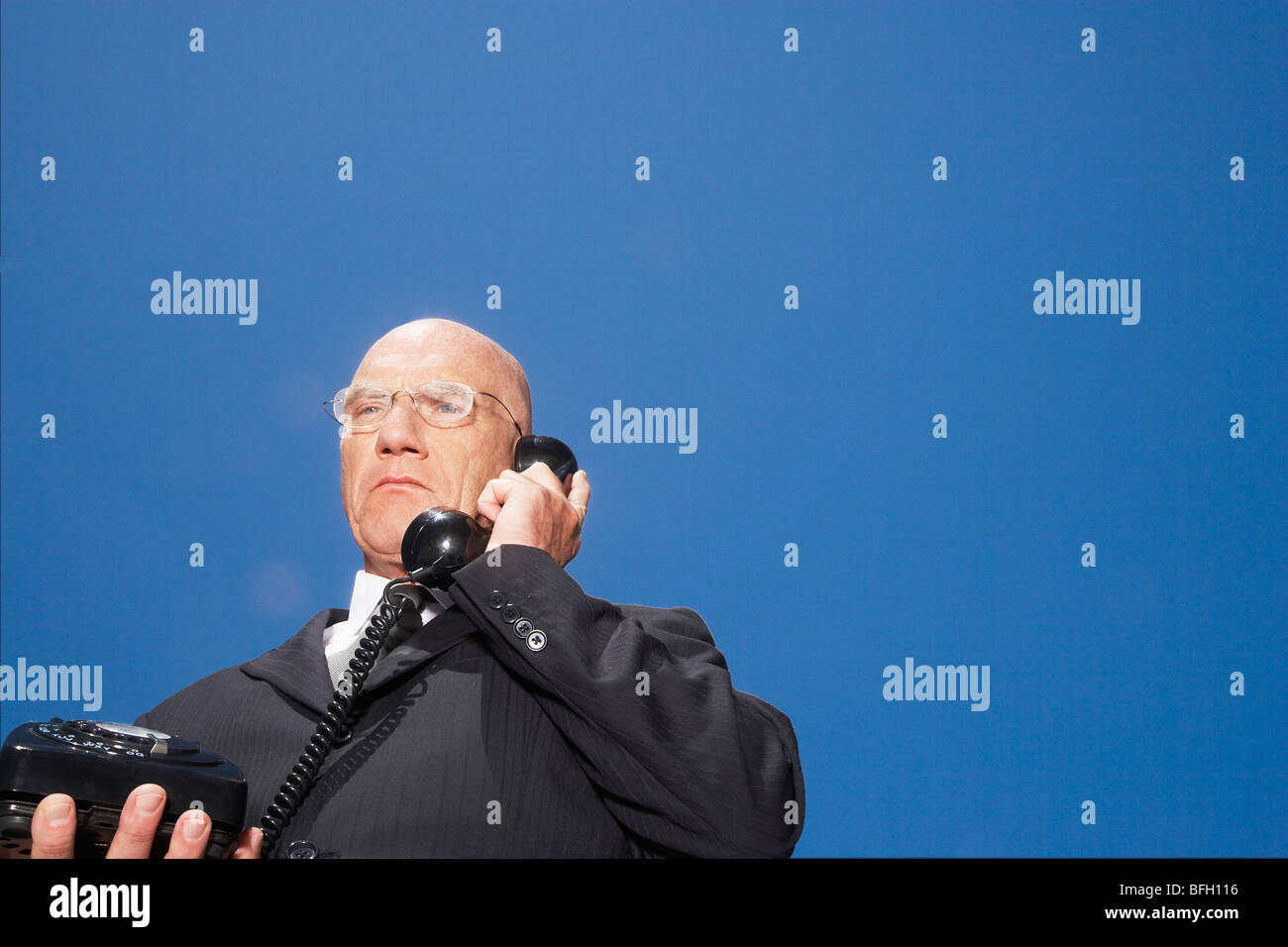 Standing spectacles authority communication hi-res stock photography ...