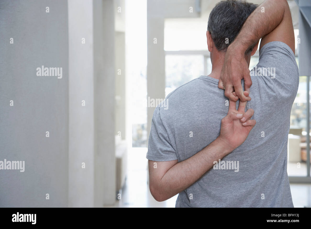 Arms Behind Back Back View Stock Photos & Arms Behind Back Back View ...