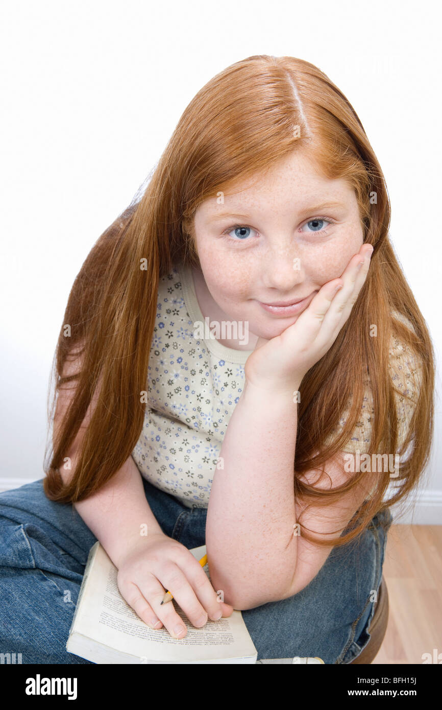 Teenage girl learning Stock Photo - Alamy