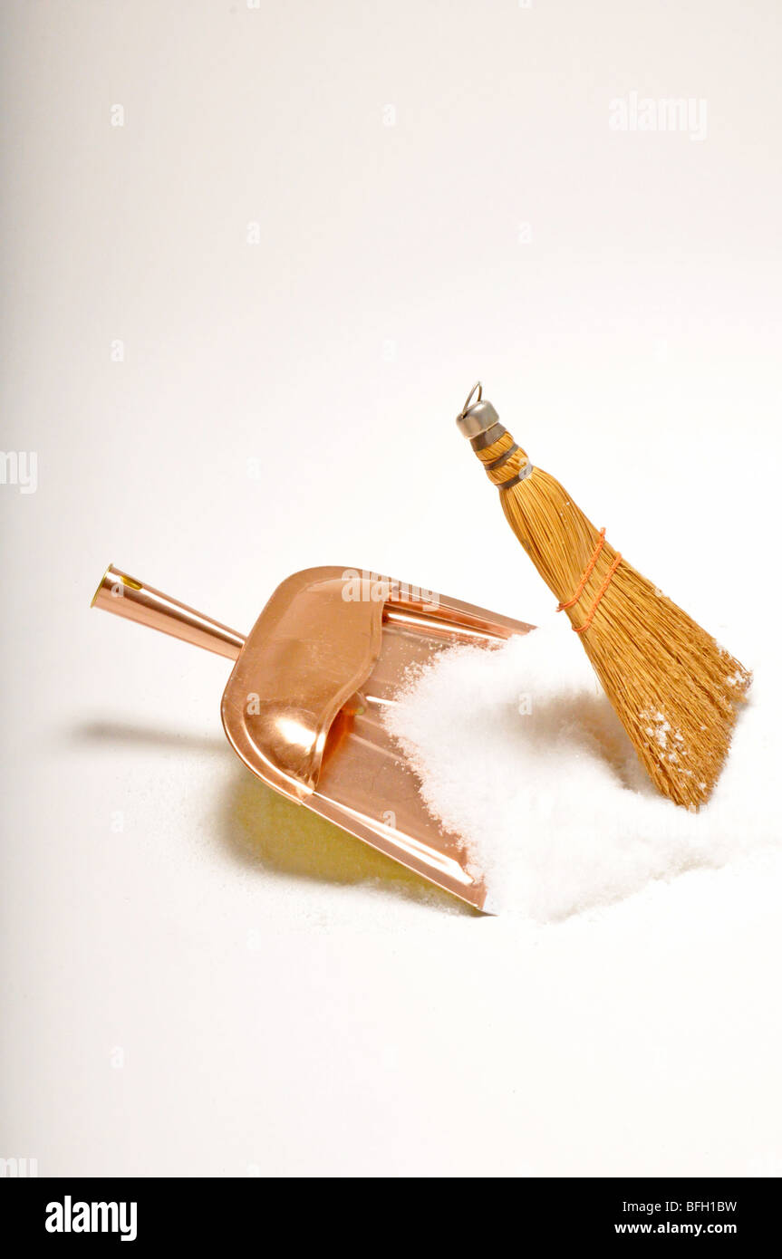 dust pan and broom sweep up white snow, no people Stock Photo - Alamy