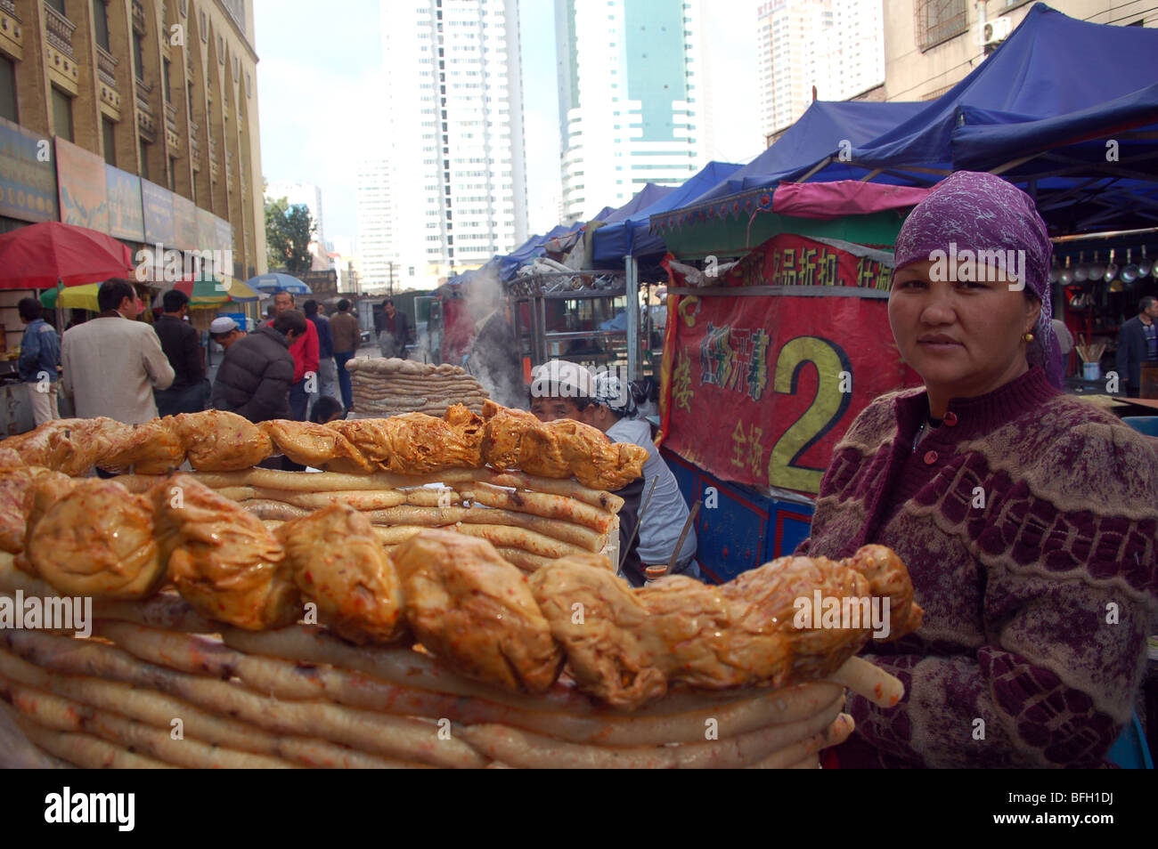 Uyghur people in the street markets of Urumqi, Xinjiang, CHINA Stock ...