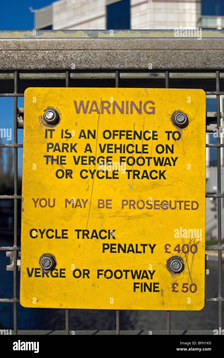 british traffic warning sign with penalties for parking on verge ...
