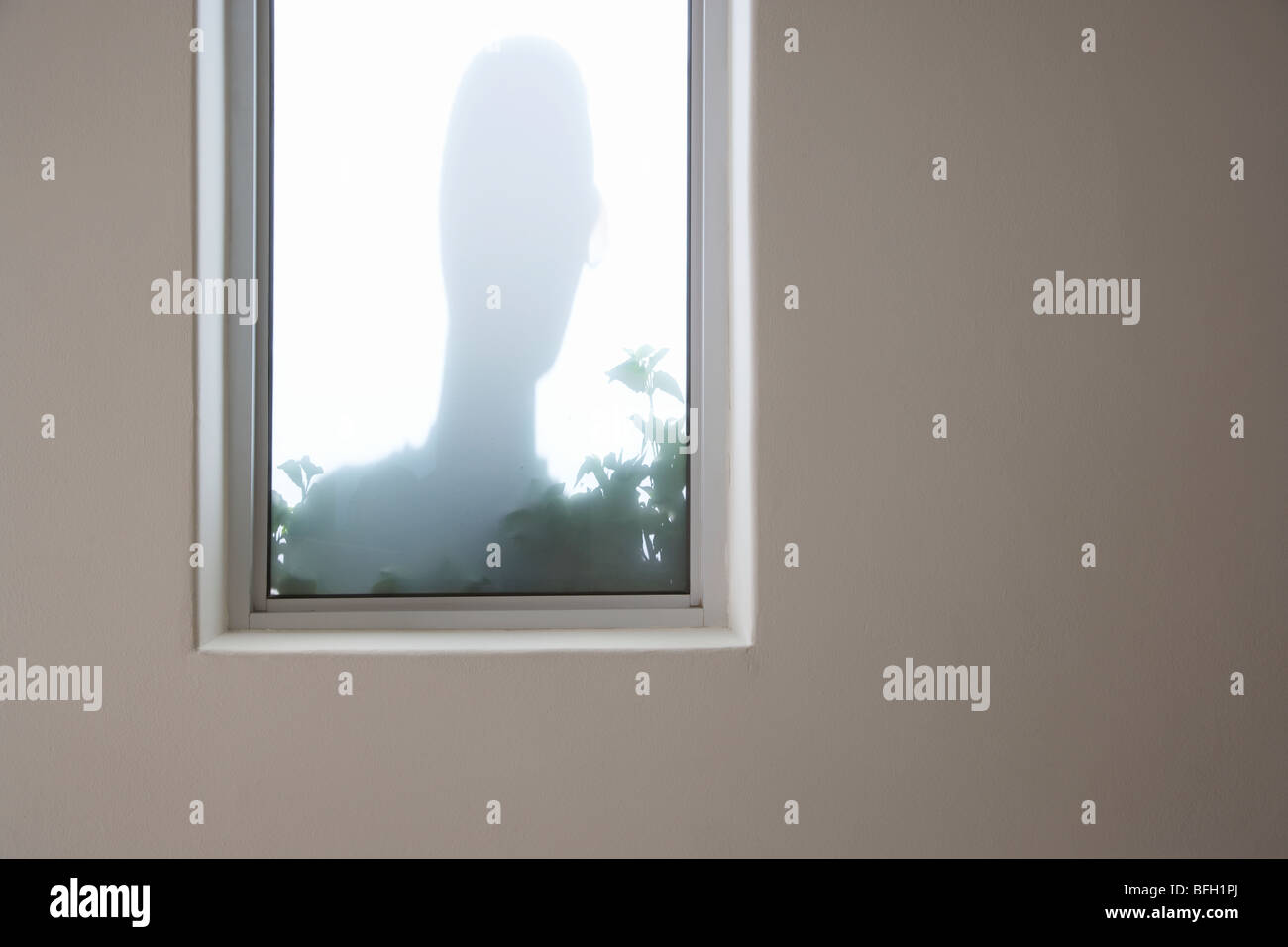Shadow of a Man Behind Window Stock Photo - Alamy