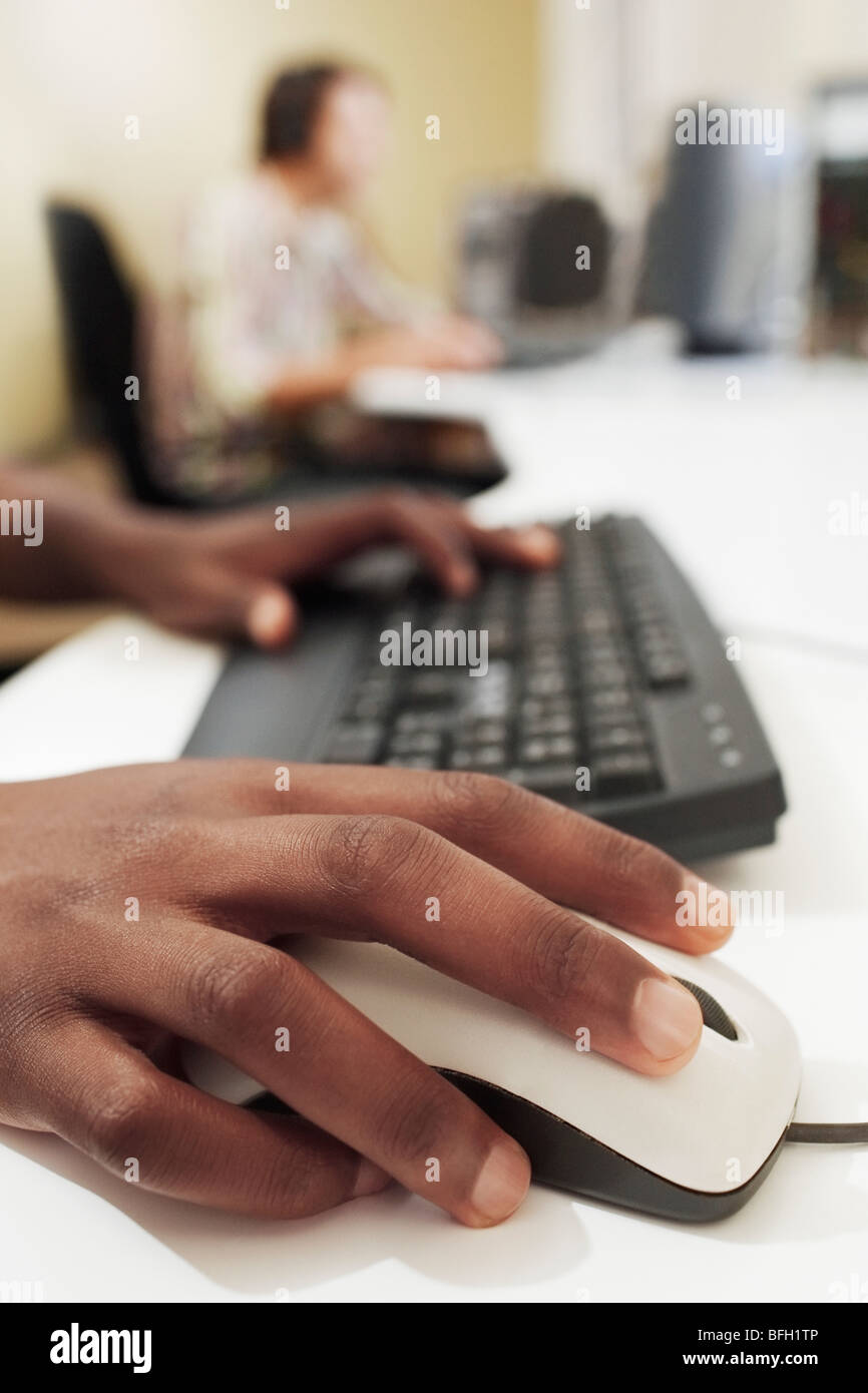 Man using keyboard and mouse, close-up Stock Photo - Alamy