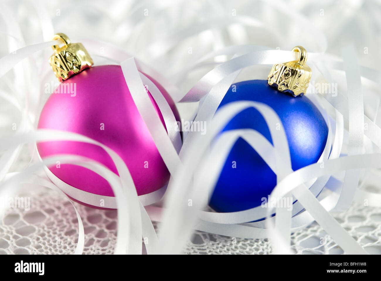 Christmas tree colorful balls with white ribbon Stock Photo - Alamy