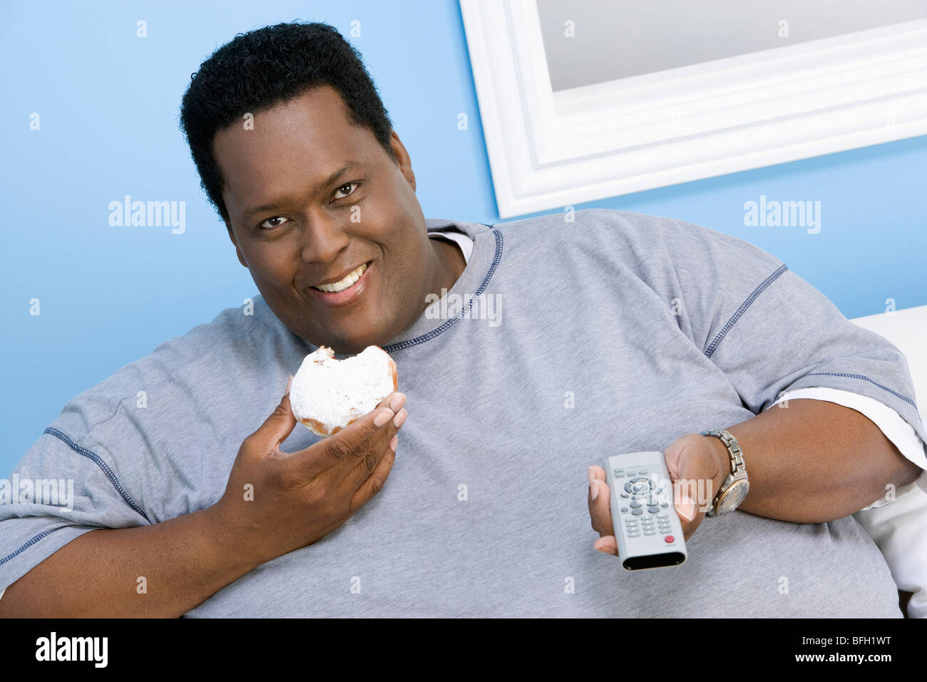 Man Eating Donut Stock Photo - Alamy