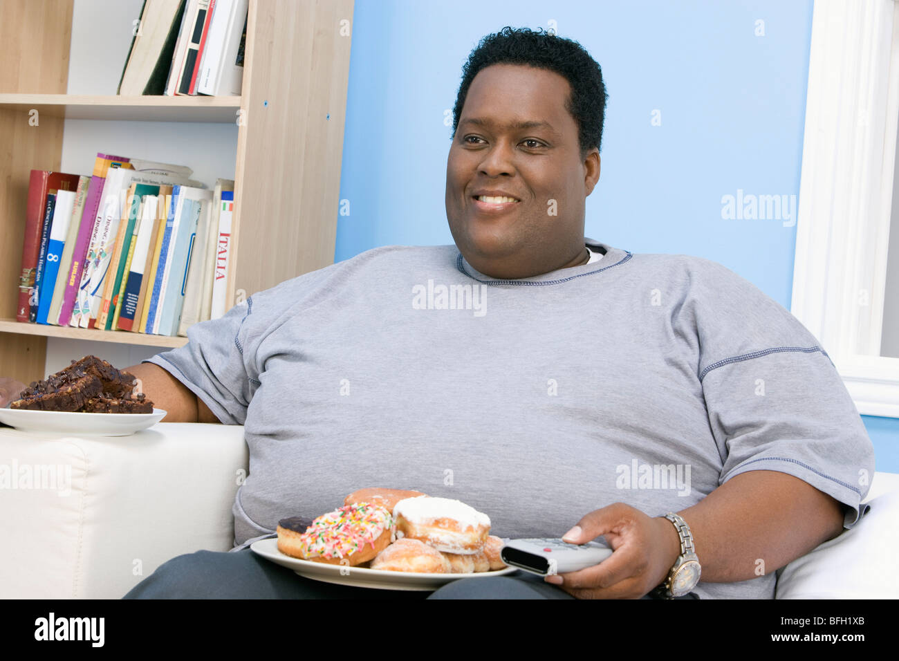 Man Eating Junk Food Stock Photo - Alamy