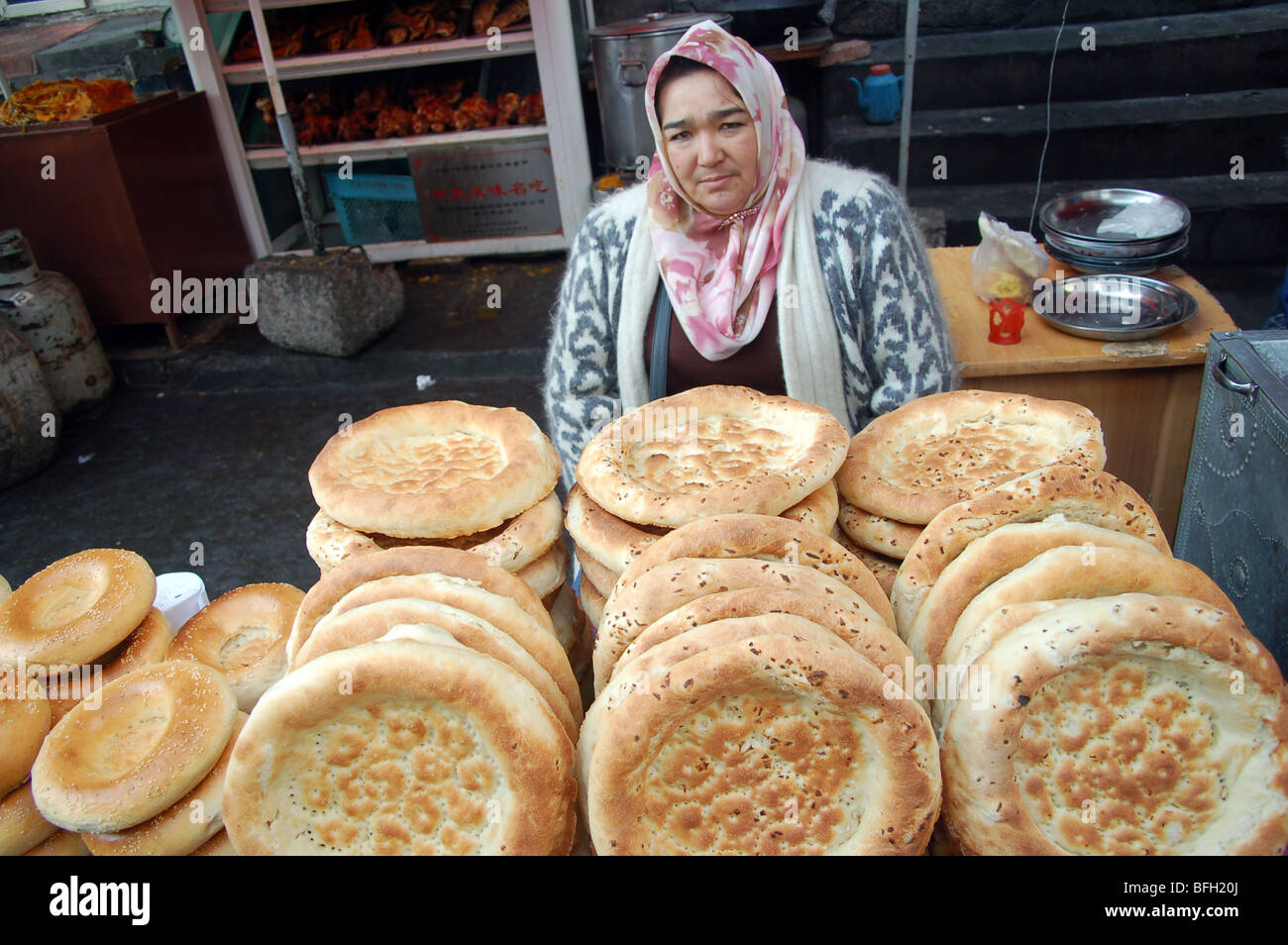 Uyghur people in the street markets of Urumqi, Xinjiang, CHINA Stock ...