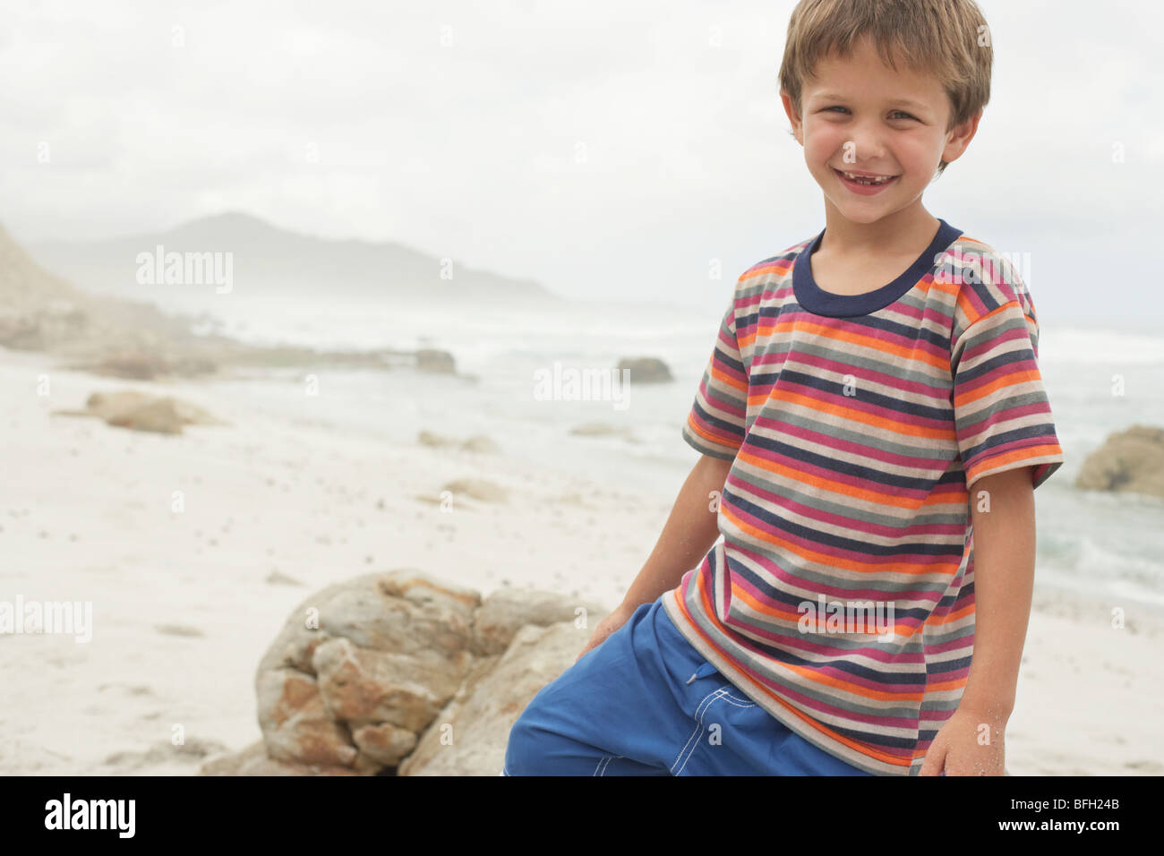 Smiling Boy on Beach Stock Photo - Alamy