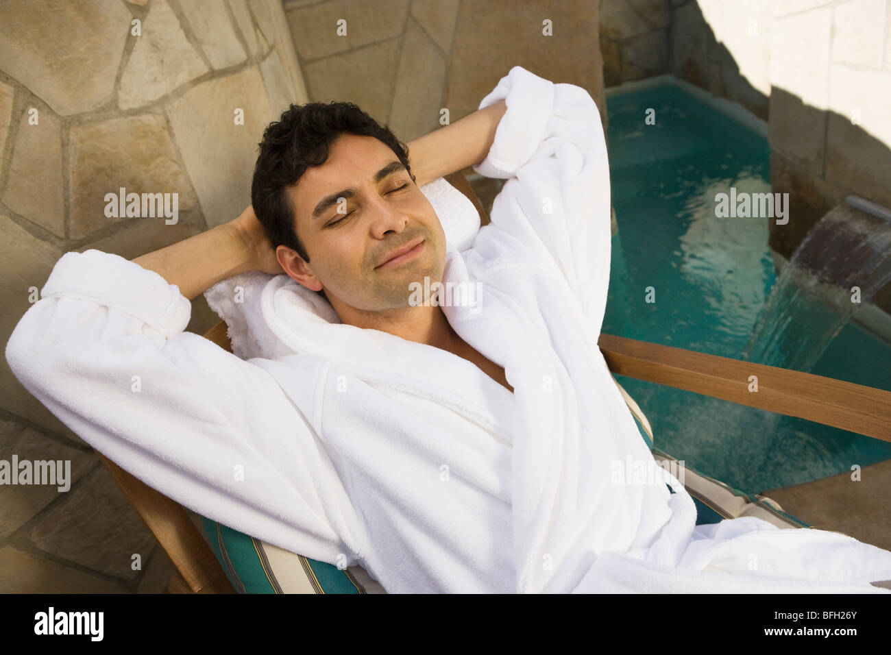 Man in bathrobe, relaxing outdoors Stock Photo - Alamy