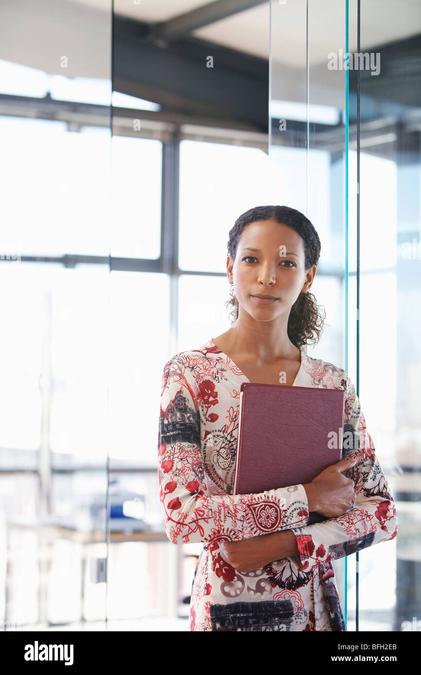 Office Worker Carrying File Folder Stock Photo - Alamy