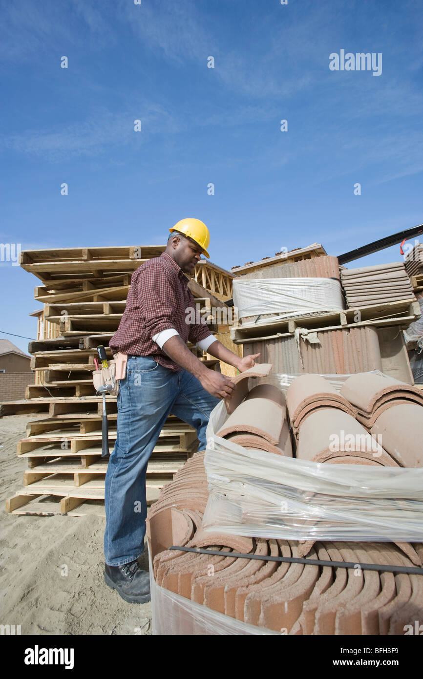 Construction worker at work on site Stock Photo - Alamy