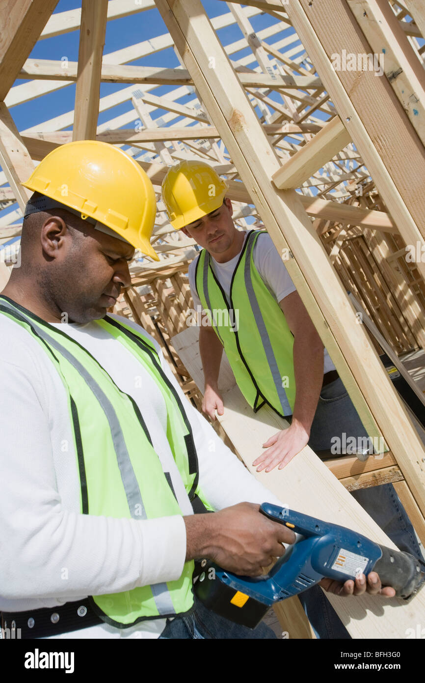 Two construction workers on site Stock Photo - Alamy
