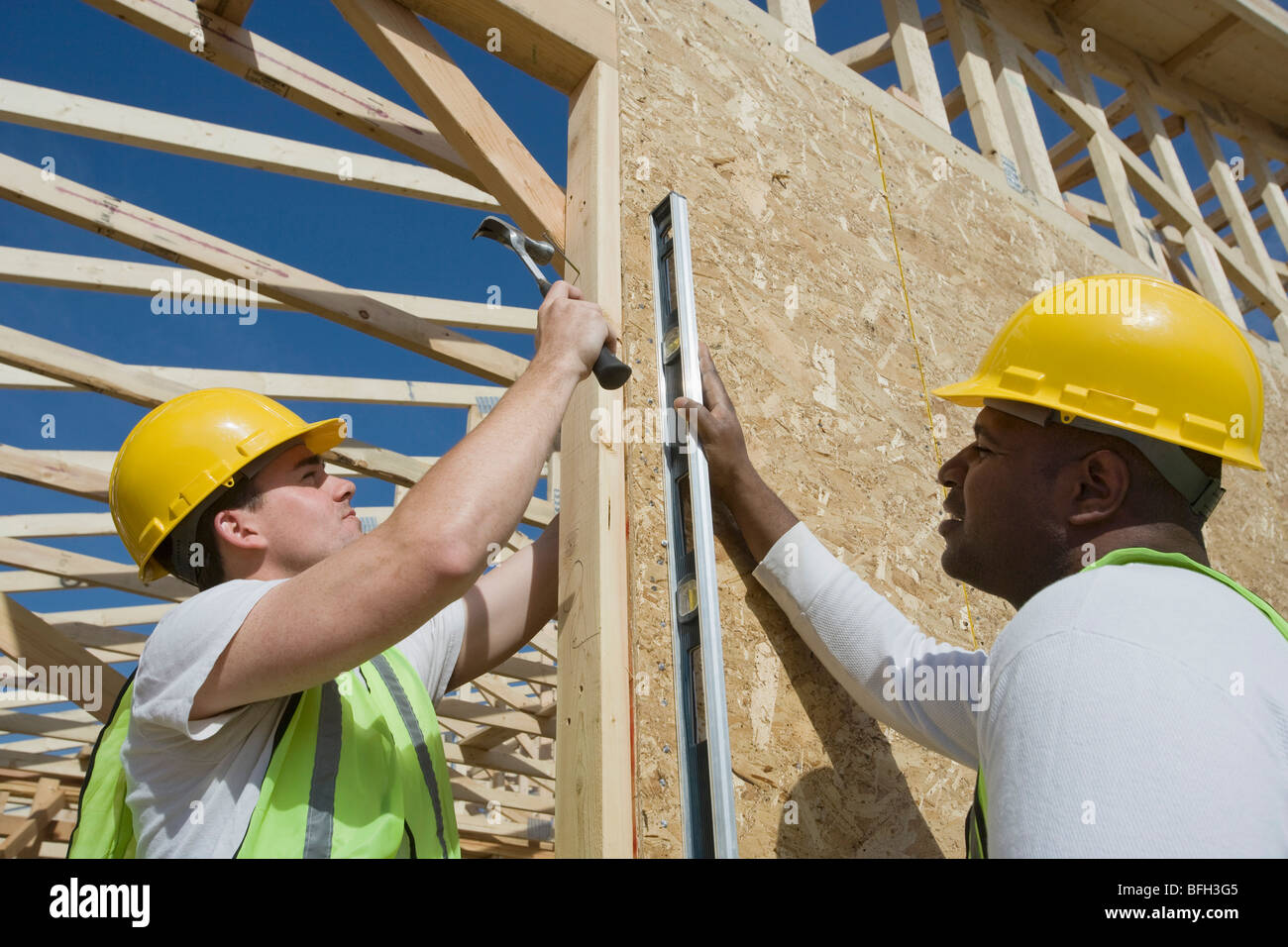 Two construction workers on site Stock Photo - Alamy