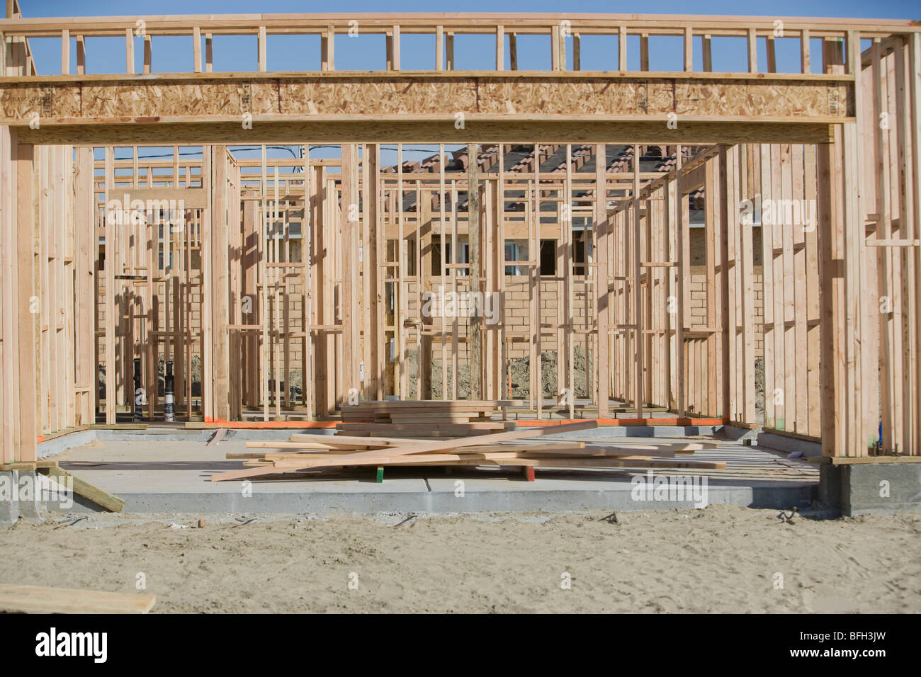 Wooden house construction Stock Photo - Alamy