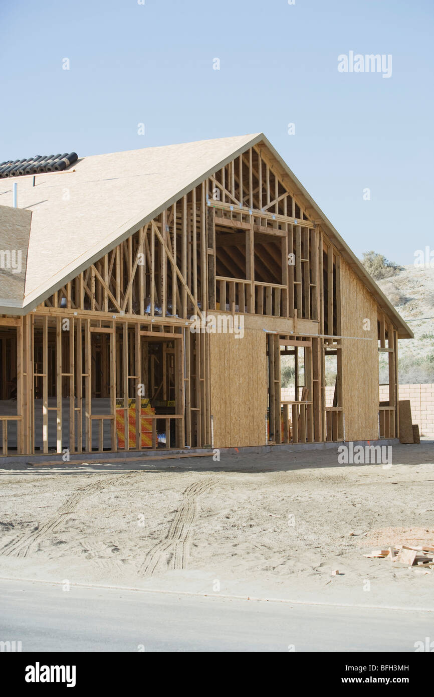 Wooden house construction Stock Photo - Alamy