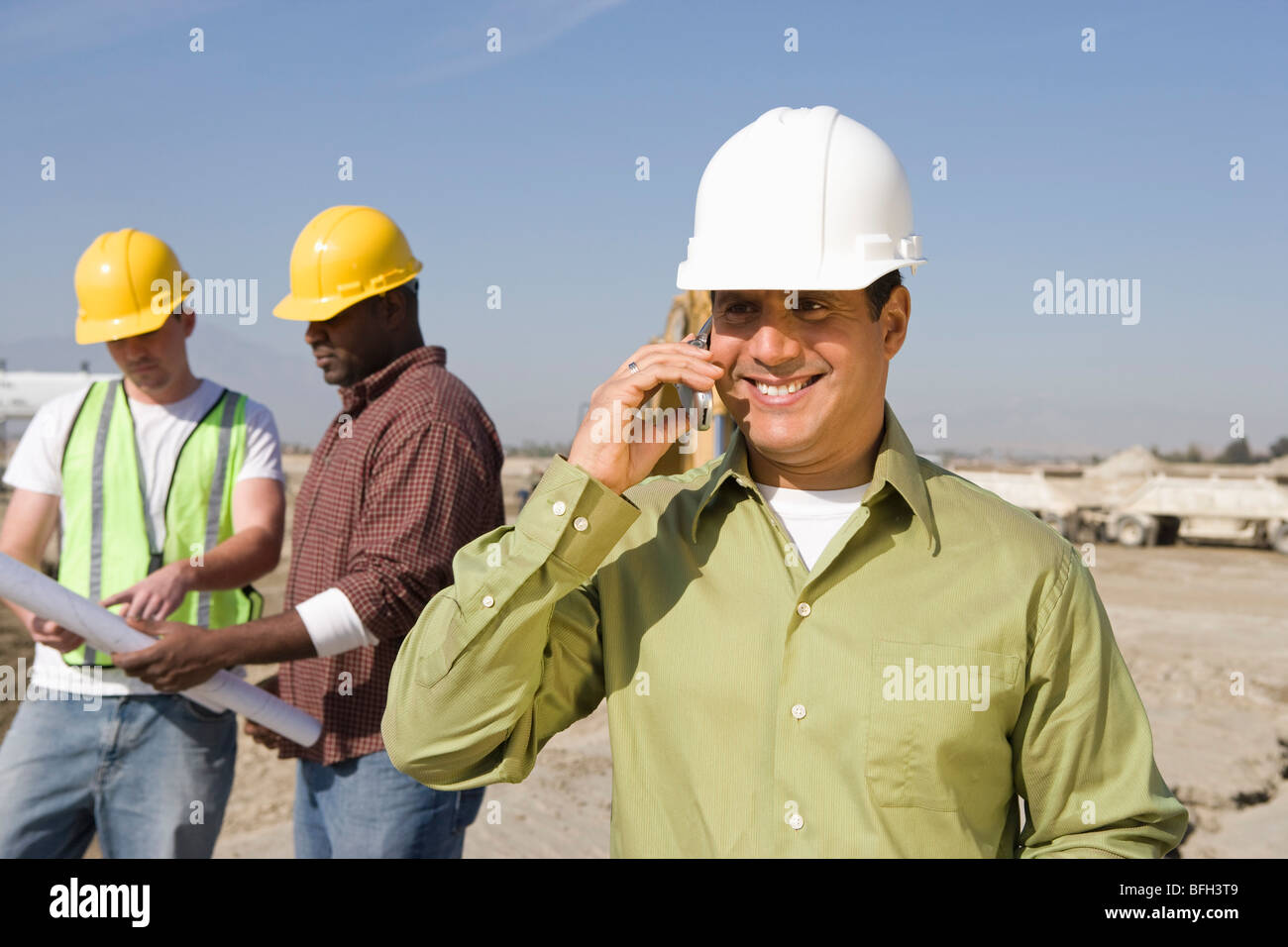 Construction workers on site Stock Photo - Alamy