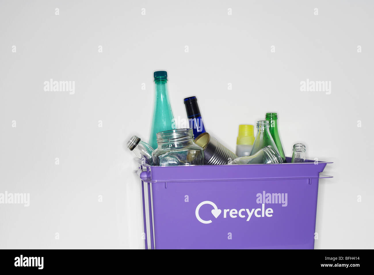 Recycling container filled with empty jars and bottles Stock Photo - Alamy