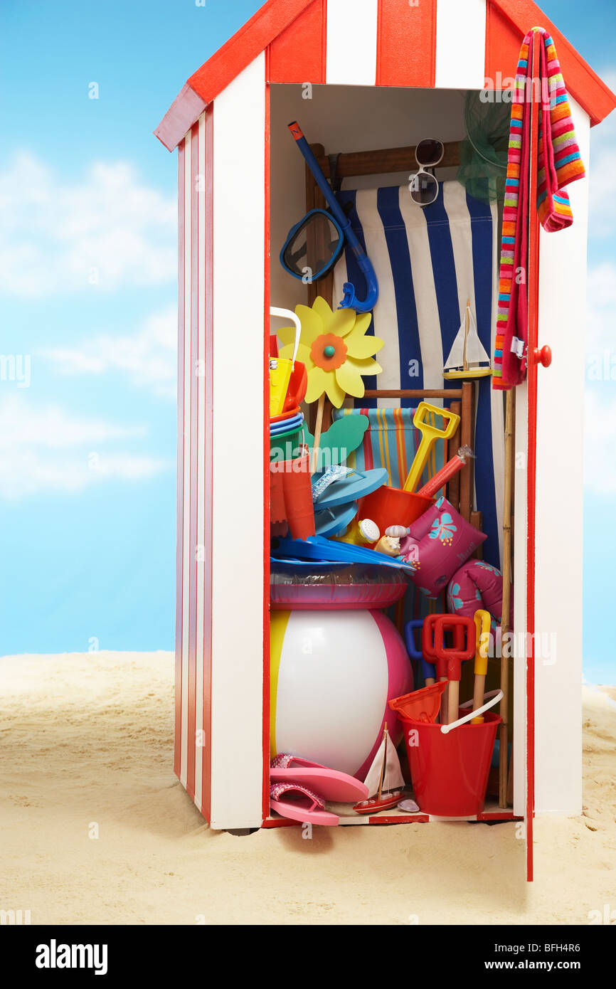 Beach storage cabin with beach toys Stock Photo - Alamy