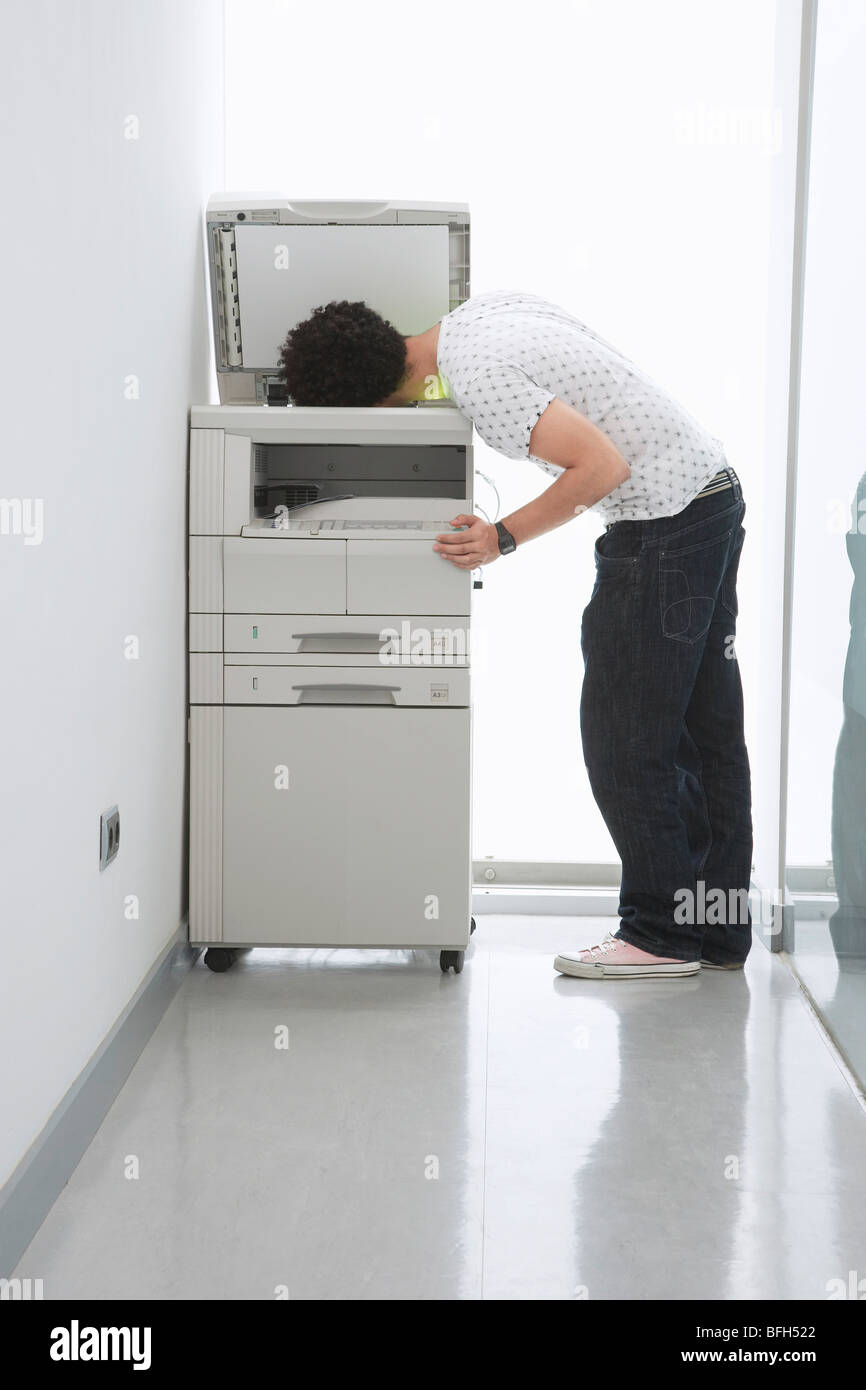 Photocopying head hi-res stock photography and images - Alamy