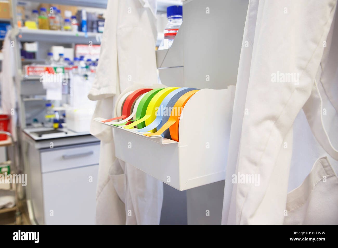 Rolls of multi-coloured labelling tape in laboratory Stock Photo - Alamy