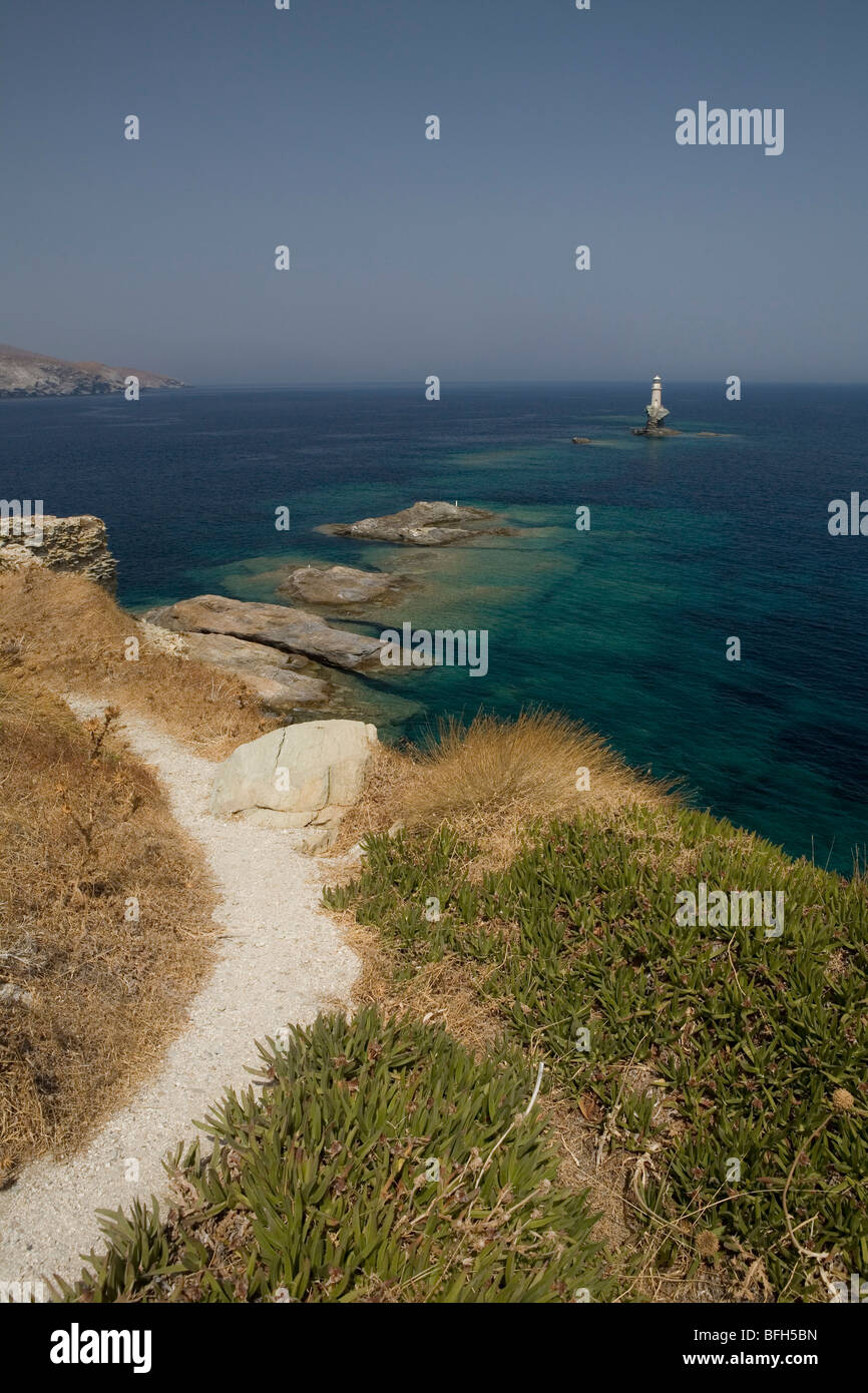 The lighthouse on Andros island, in the Cyclades, Greece Stock Photo ...