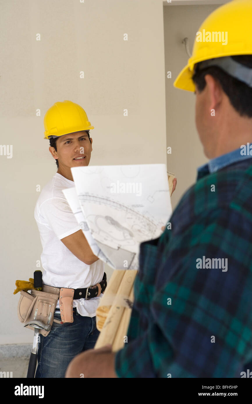 Construction Workers at work Stock Photo - Alamy