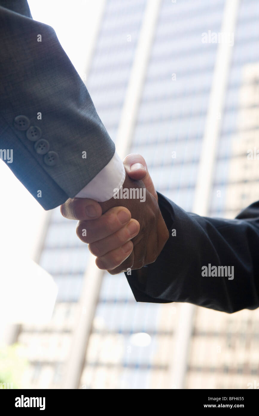 Close-up of businessmen handshake outdoors Stock Photo - Alamy
