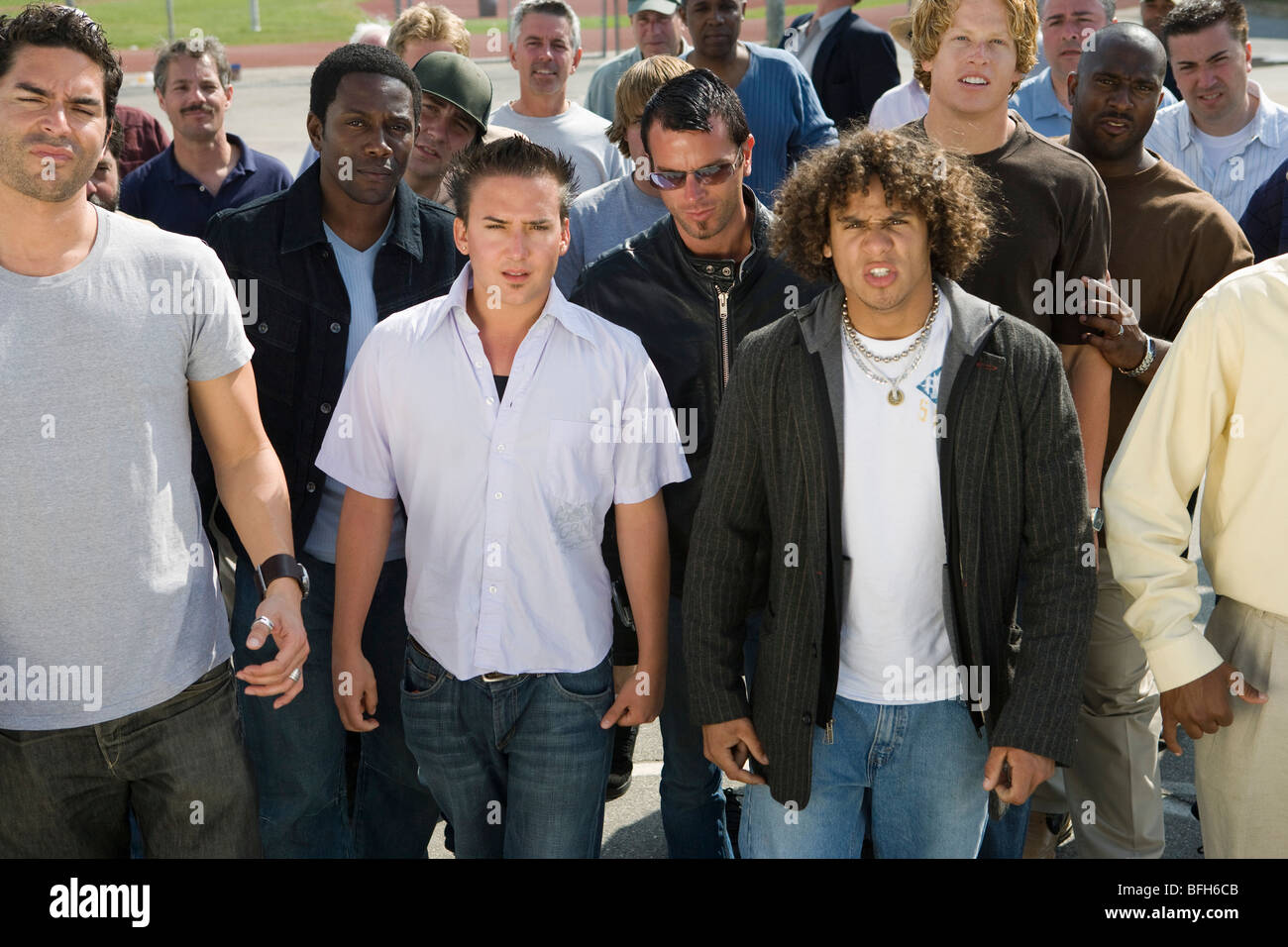 Crowd of male protestors Stock Photo - Alamy