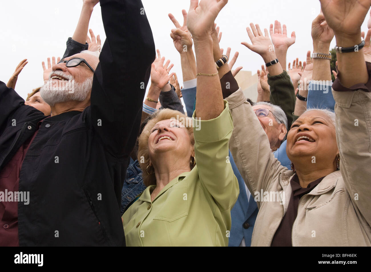 Crowd of seniors celebrating Stock Photo - Alamy